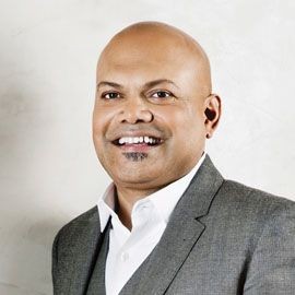 Ravi Naidoo’s Booking Agent and Speaking Fee - Speaker Booking Agency